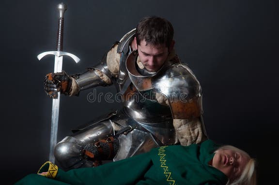 Great Knight Looking at Dead Body Stock Photo - Image of face ...