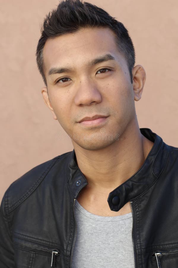 Tough Looking Hispanic Man With Long Hair And Tattoos Stock Image ...