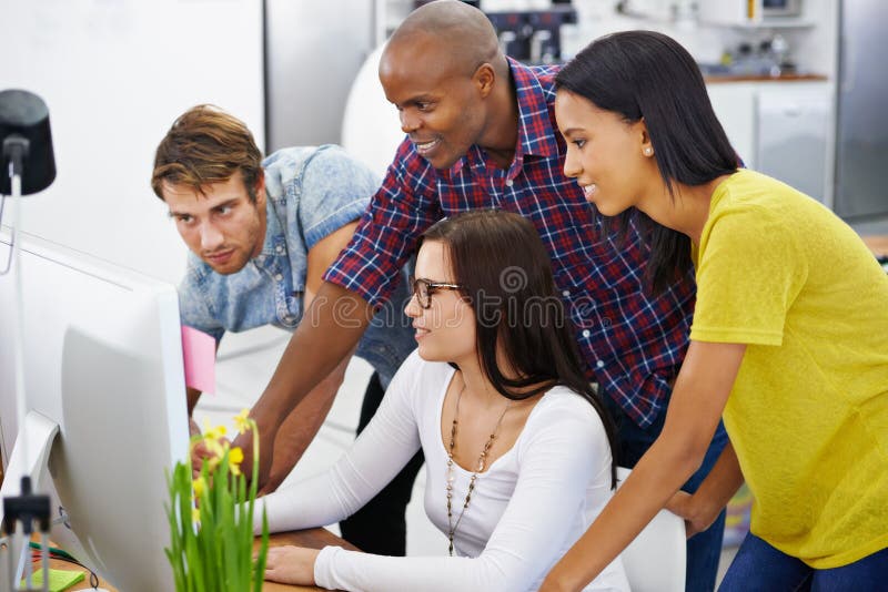 Great Minds Getting Together. a Young Designers at Work in an Office ...