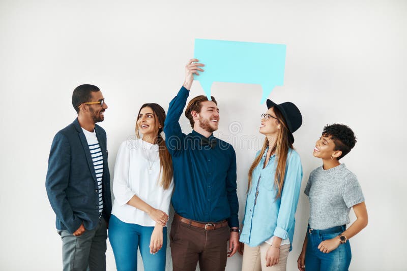 Great Minds Think Alike. a Diverse Group of Creative Employees Holding ...