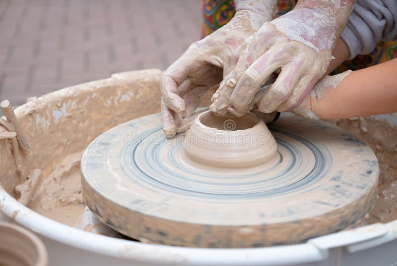 Hands Forming Clay on the Pottery Wheel Stock Image - Image of handmade ...