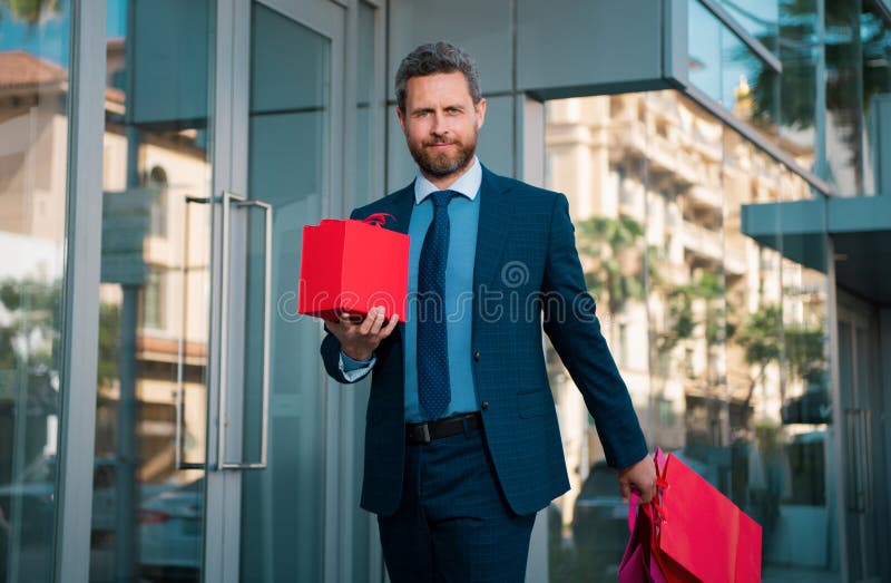 Great Present. Man with Gift Box and Smiling while Standing Against ...