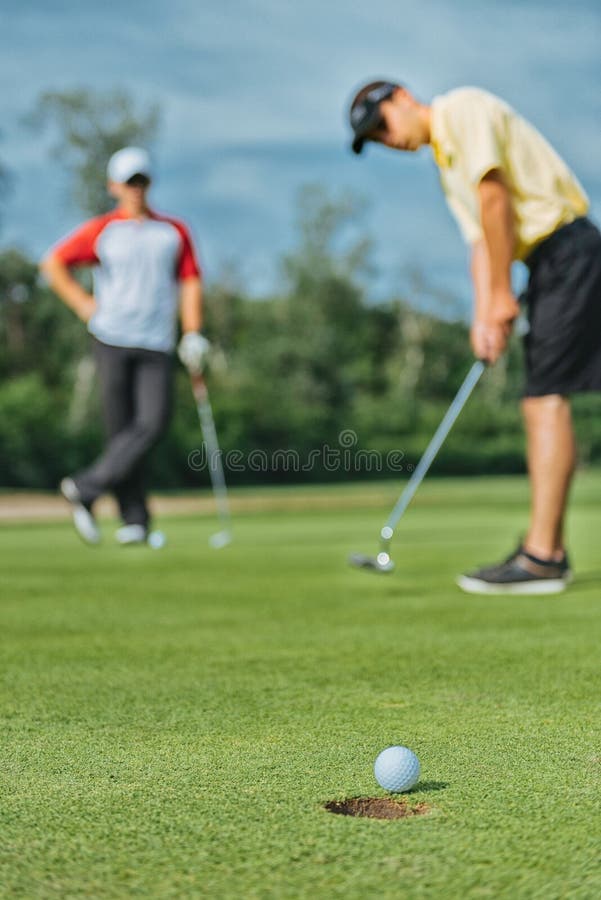 Great Putting stock photo. Image of sport, pursuit, golfer - 224958576