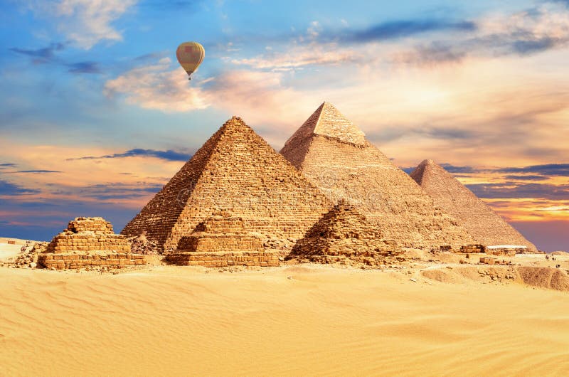 The Great Pyramids of Egypt Under a Colorful Desert Sky, Giza Stock ...