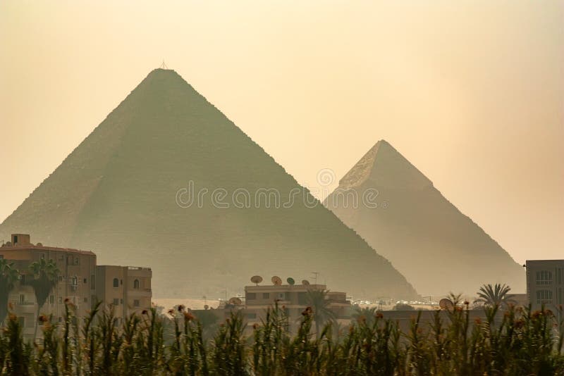 The Great Pyramids Towering Beyond Giza City Stock Image - Image of ...