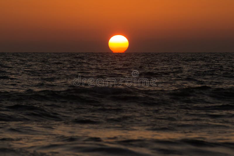 The Great Red of Sunset the Sun Sinks in the Sea Stock Photo - Image of ...
