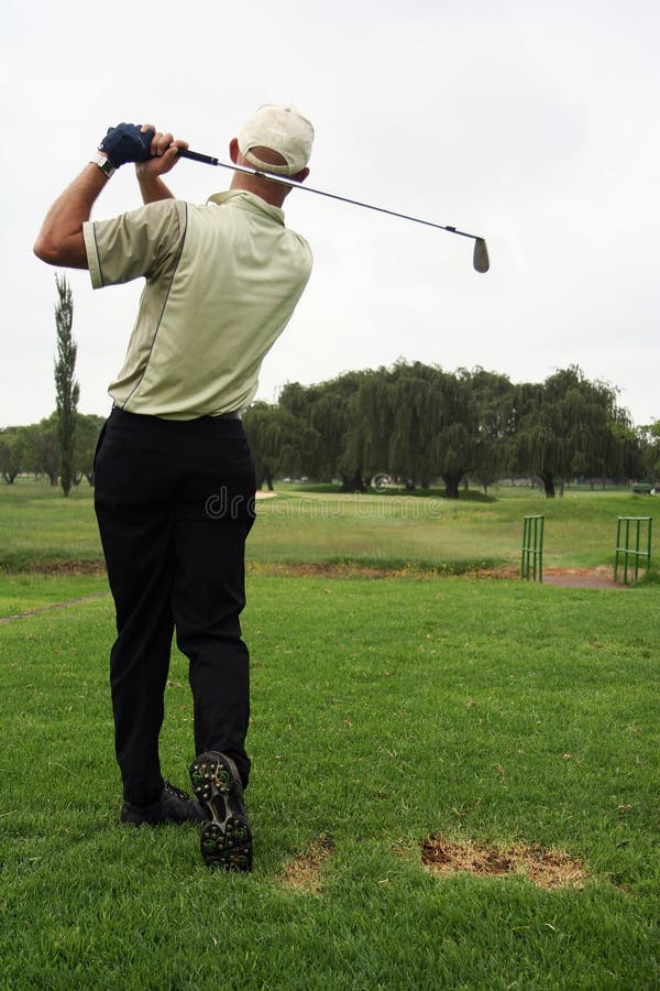 Golfing action stock photo. Image of destination, golfing - 1413148