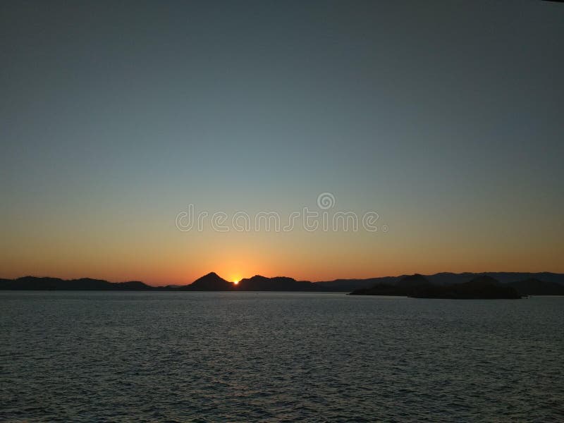 Great sunrise on the boat stock photo. Image of view - 261769296