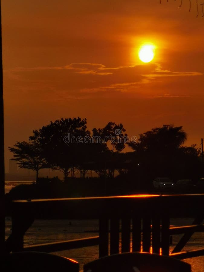 Great sunset next to beach stock image. Image of great - 276388669