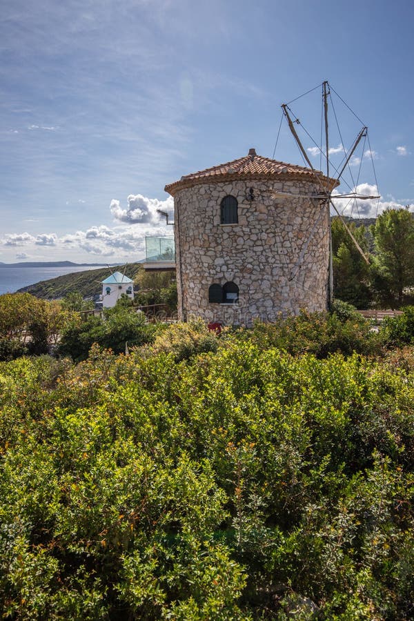 Great Typical Greek Windmill in the Morning. Cliff in the Mediterranean ...