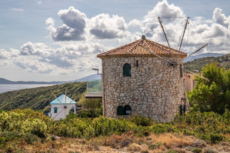 Great Typical Greek Windmill in the Morning. Cliff in the Mediterranean ...