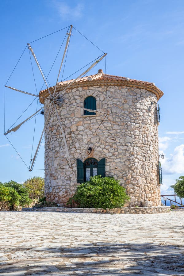 Great Typical Greek Windmill in the Morning. Cliff in the Mediterranean ...