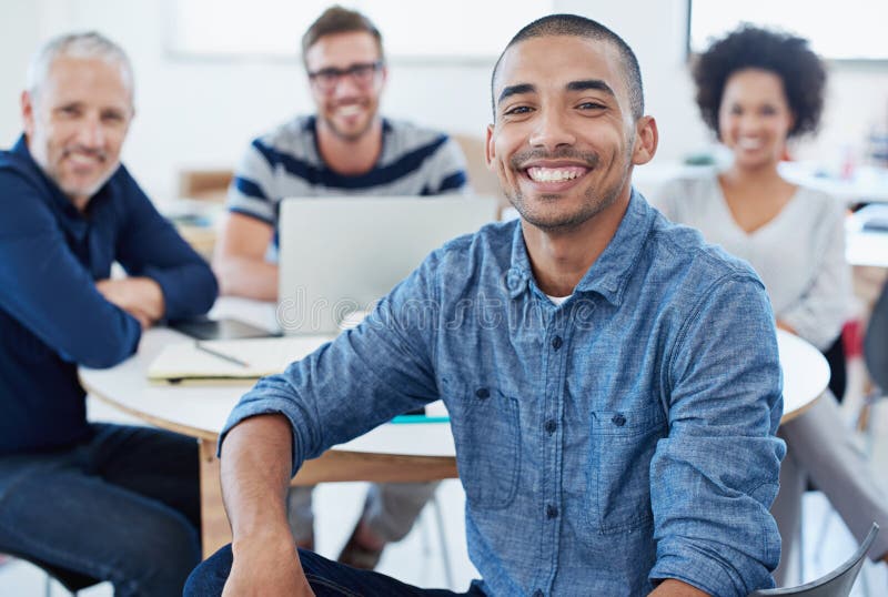 This is a Great Work Environment. Portrait of a Young Office Worker ...