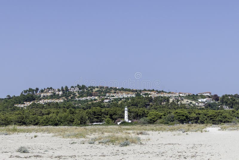 Greece, Possidi, Village Seen from the Beach with a White Lighthouse ...