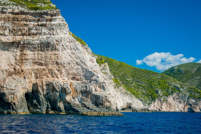 Greece, Zakynthos, August 2016. Rocks, Caves and Blue Water Stock Photo ...