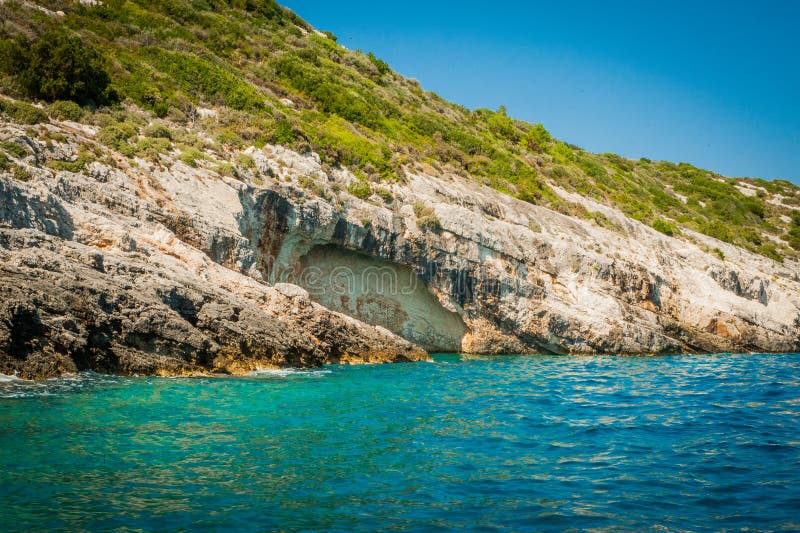 Greece, Zakynthos, August 2016. Rocks, Caves and Blue Water Stock Photo ...