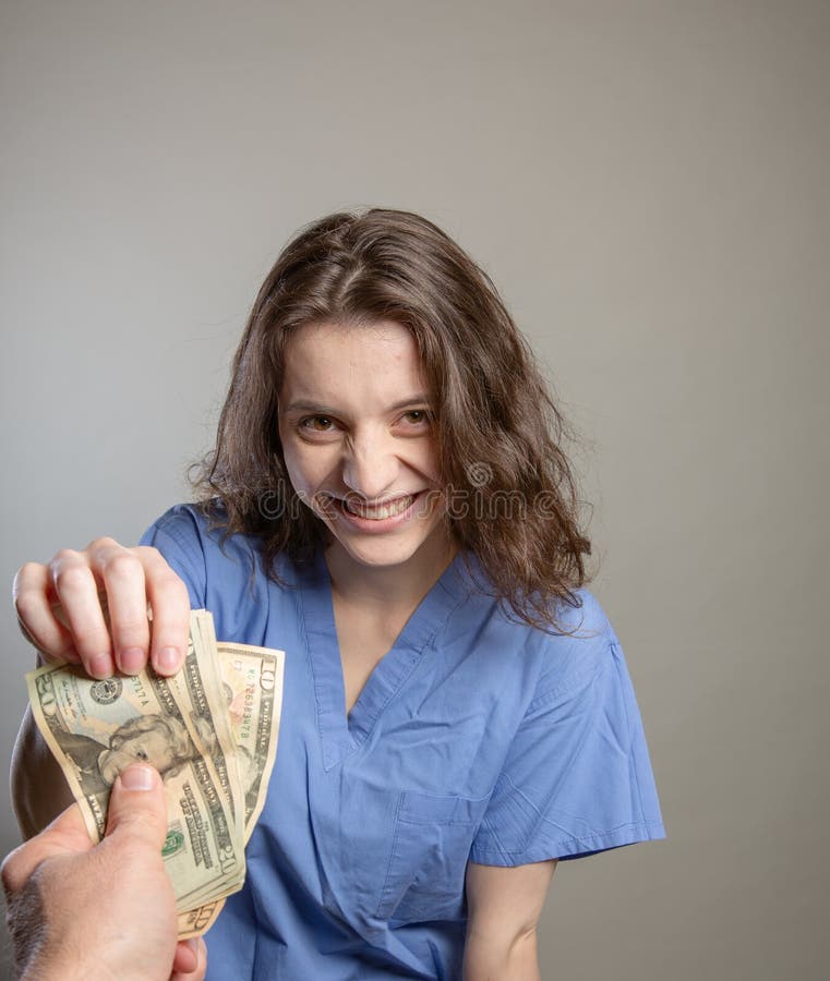 Greedy Doctor taking cash stock image. Image of increase - 139463103
