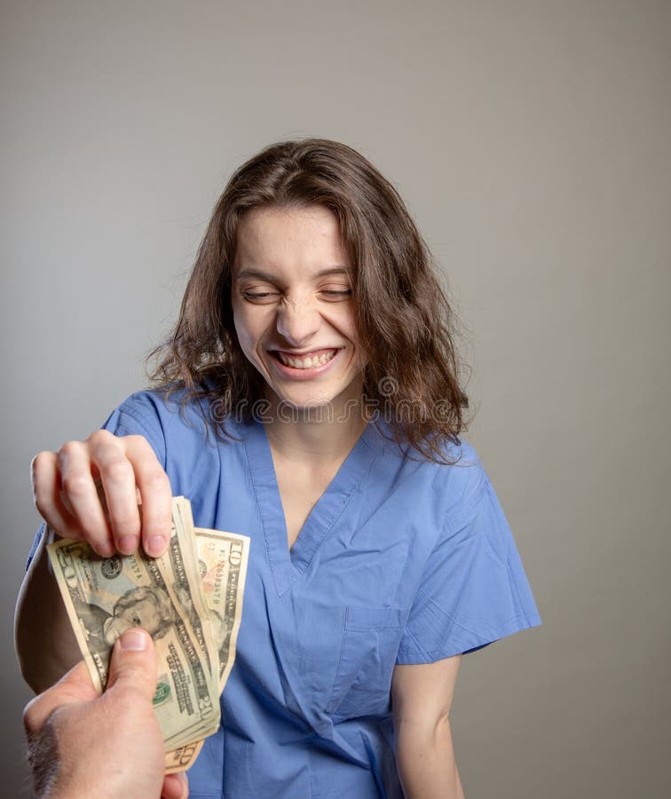 Greedy Doctor taking cash stock photo. Image of compensation - 139463176