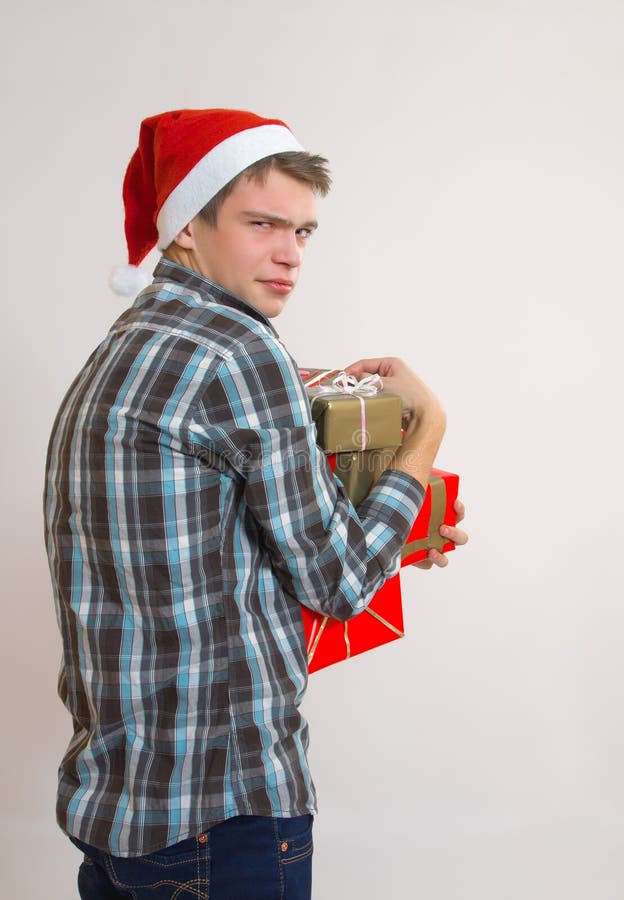 Greedy Young Man - Santa Claus Stock Image - Image of back, hands: 28373575