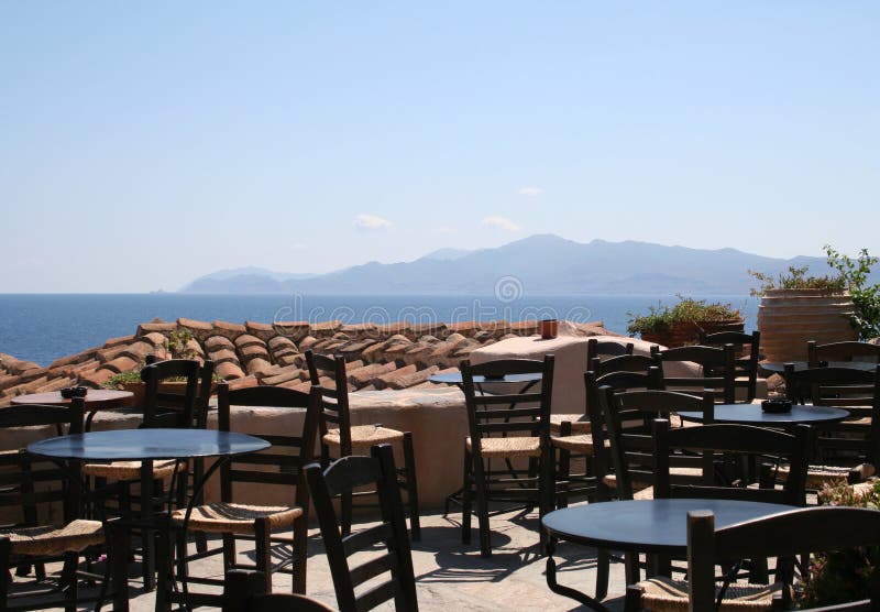 Greek Cafe stock image. Image of view, table, drink, chair - 1492479