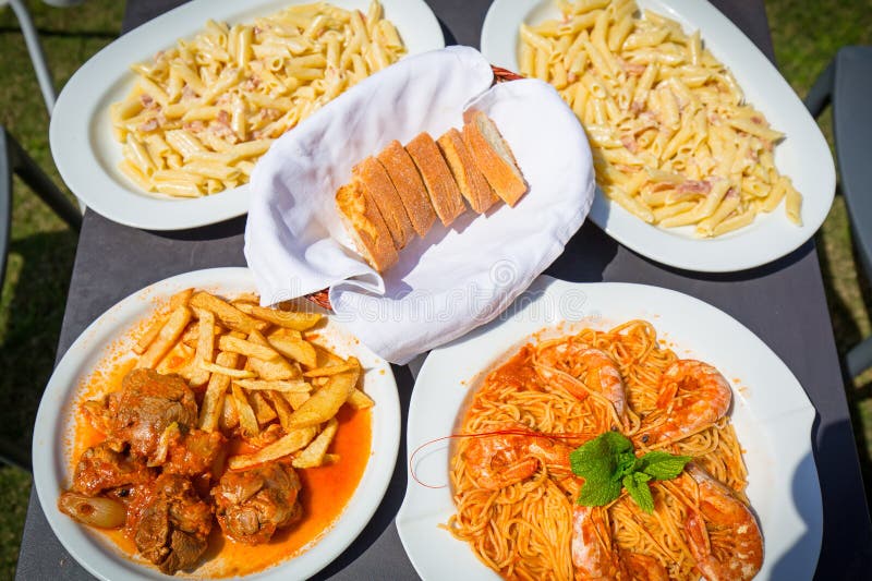 Greek dishes on table stock image. Image of carbonara - 93602363