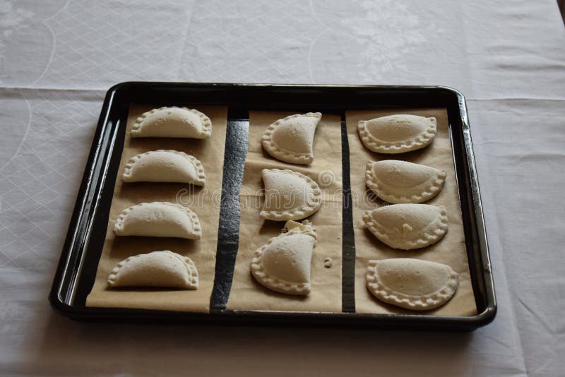 Greek Dumpling in Three Rows Stock Image - Image of cheese, cupcake ...