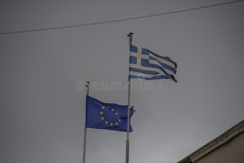 The Greek Flag and the Flag of the European Union are Waving in the ...