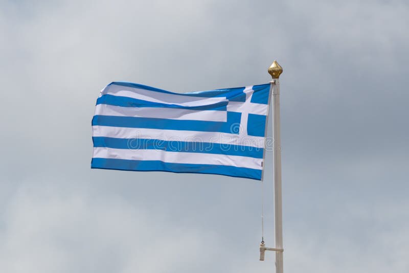 A Greek Flag Flying from a Flagpole Stock Photo - Image of waving, flag ...
