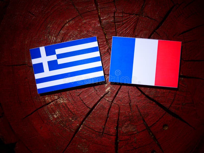 Greek Flag with French Flag on a Tree Stump Isolated Stock Image ...