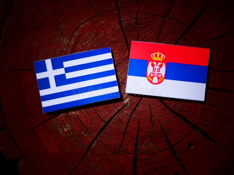 Greek Flag with Serbian Flag on a Tree Stump Isolated Stock Image ...