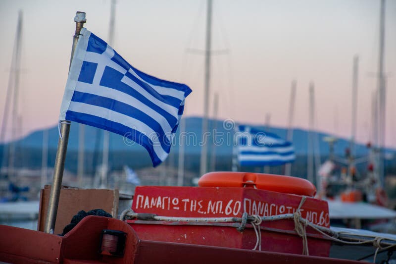 Greek flag to boat stock image. Image of greek, brand - 274894641
