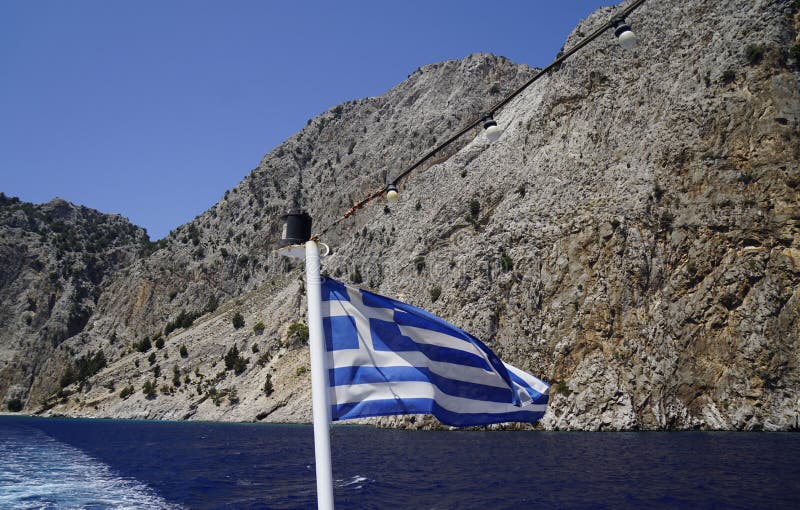 Greek flag in the wind stock image. Image of scenic - 229015669