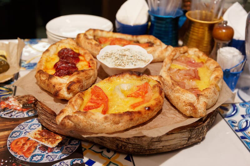Greek Pide Pastry on Restaurant Table Stock Photo - Image of tasty ...