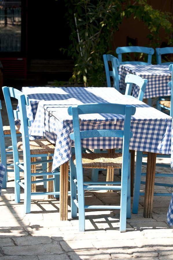 Greek Restaurant with Traditional Blue Table and Chairs Stock Image ...