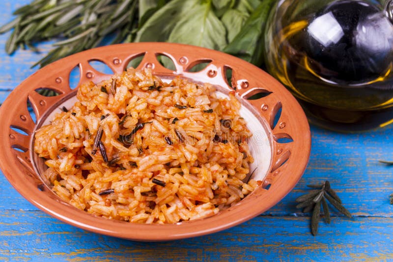 Greek rice with tomatoes stock image. Image of olive - 60669463