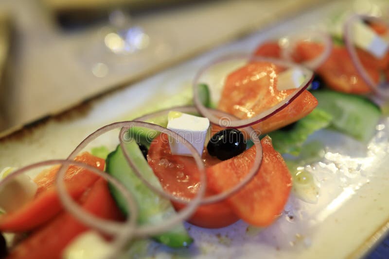 Greek salad on plate stock image. Image of appetizing - 134228891