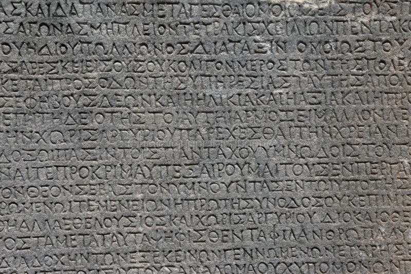 Greek Script Ancient Letters on a Rock in Ephesus, Turkey. Stock Image ...