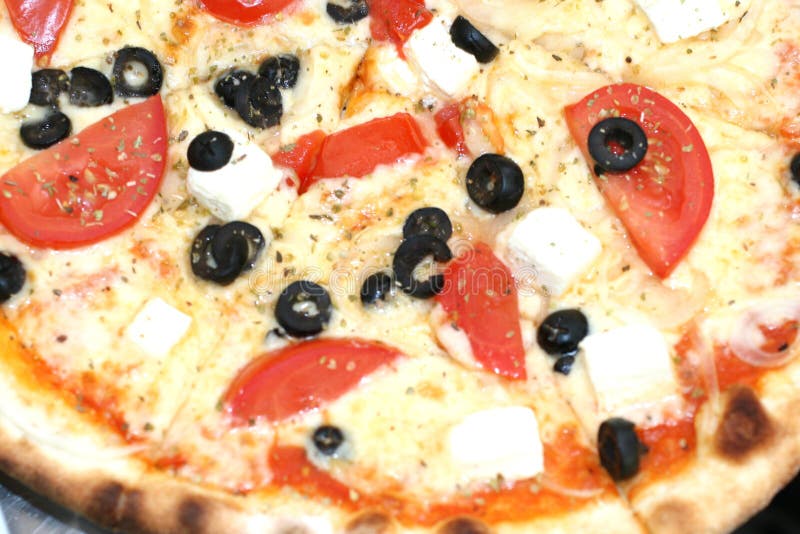 Greek style pizza stock image. Image of mozzarella, tomato - 9946101