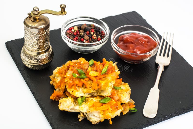 Greek Style Roast Fish on Black Stone Plate Stock Photo - Image of dish ...