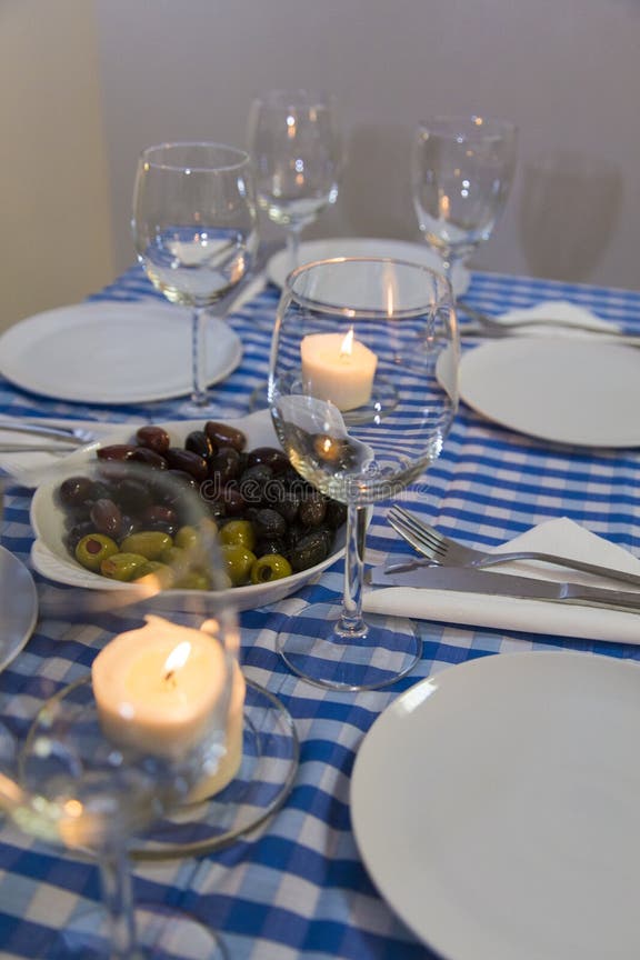 Greek Style Table Arrangement with a Plate Filled with Different Types ...