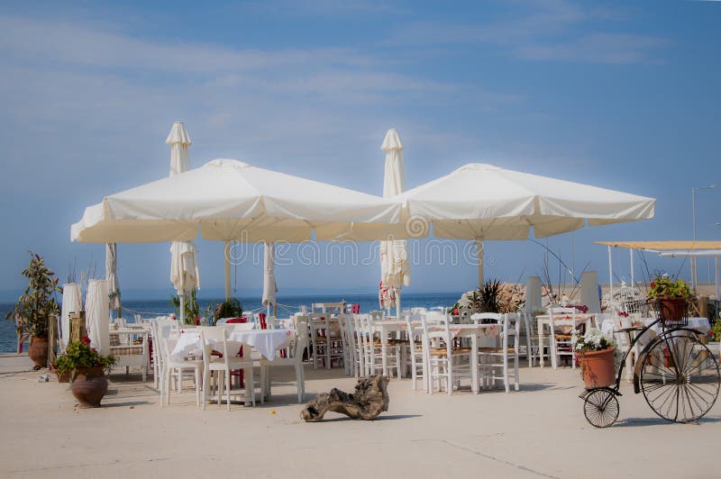 Greek tavern on the beach stock image. Image of sand - 21432757