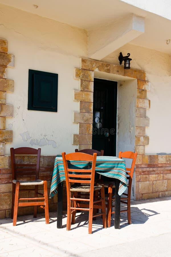 Greek Taverna stock image. Image of crete, vertical, chairs - 19643179