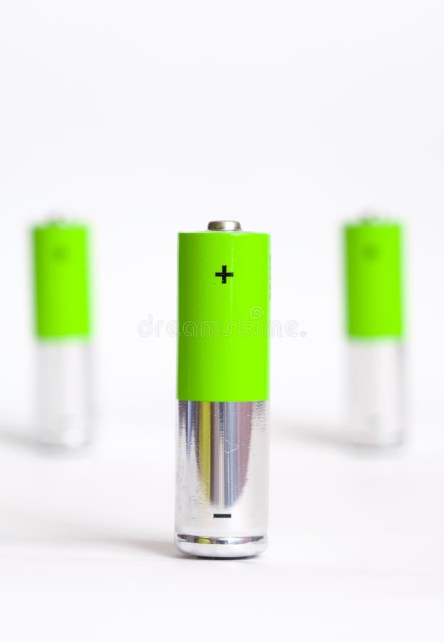 Green AA Batteries Closeup stock photo. Image of energy - 231402528