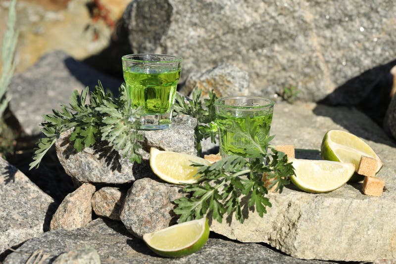 Green Absinthe Drink on the Black Background with Sugar and Lime Stock ...