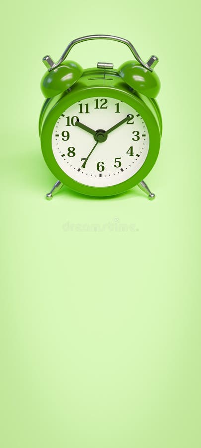 Green Alarm Clock on Green Background with Copy Space Stock ...