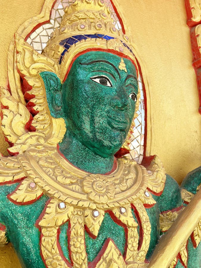 Green Angel Statue on Gold Wall Stock Photo - Image of architecture ...