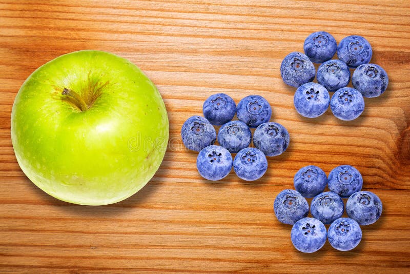 Green Apple and Blueberries on Wooden Desk Stock Image - Image of apple ...