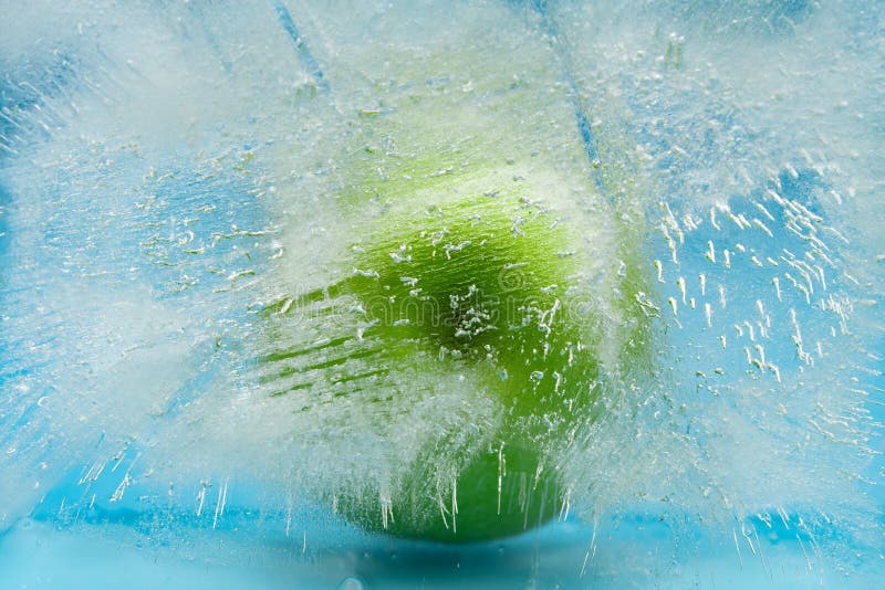 A Green Apple in a Frozen Ice Block Stock Image - Image of juicy, food ...