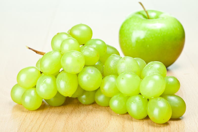 Green apple and grapes stock photo. Image of food, juicy - 25863648