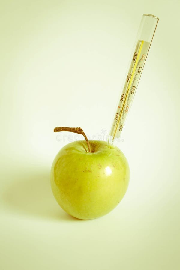 Green Apple and Thermometer As a Natural Remedy Against Flu Stock Photo ...
